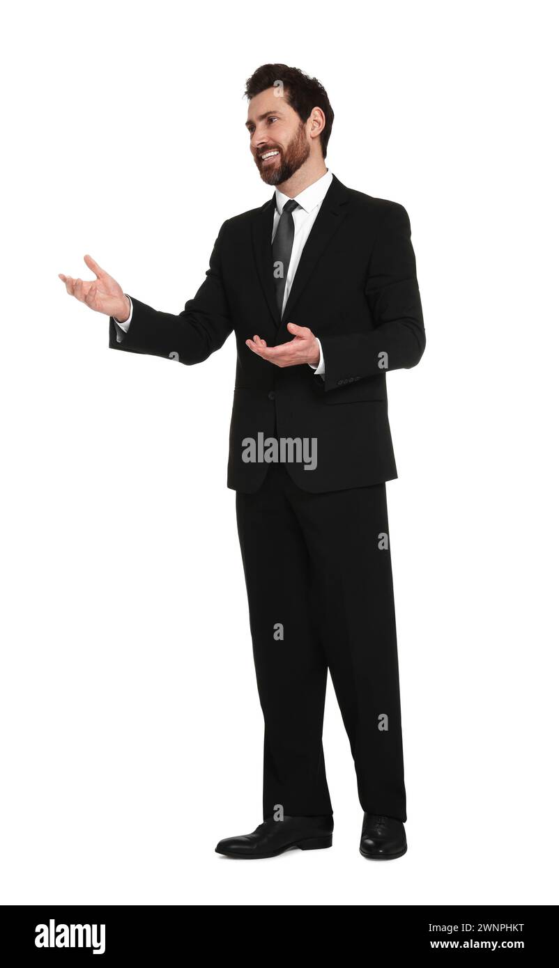 Handsome man greeting someone on white background Stock Photo - Alamy