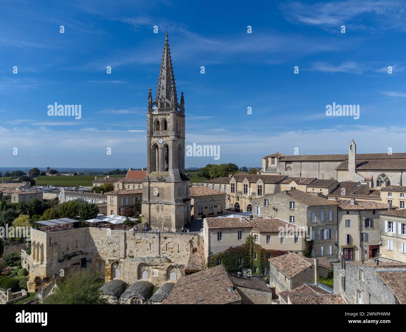 Aerial views of green vineyards, old houses and narrow hilly streets of ...