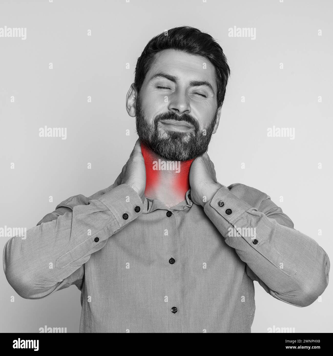 Man suffering from rheumatism on light background. Black and white ...