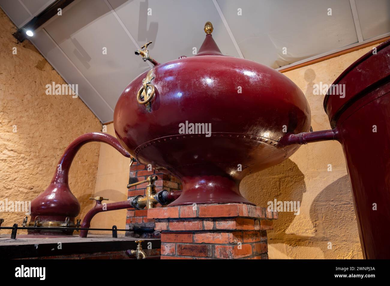 Double distillation process of cognac spirit in Charentias copper still ...