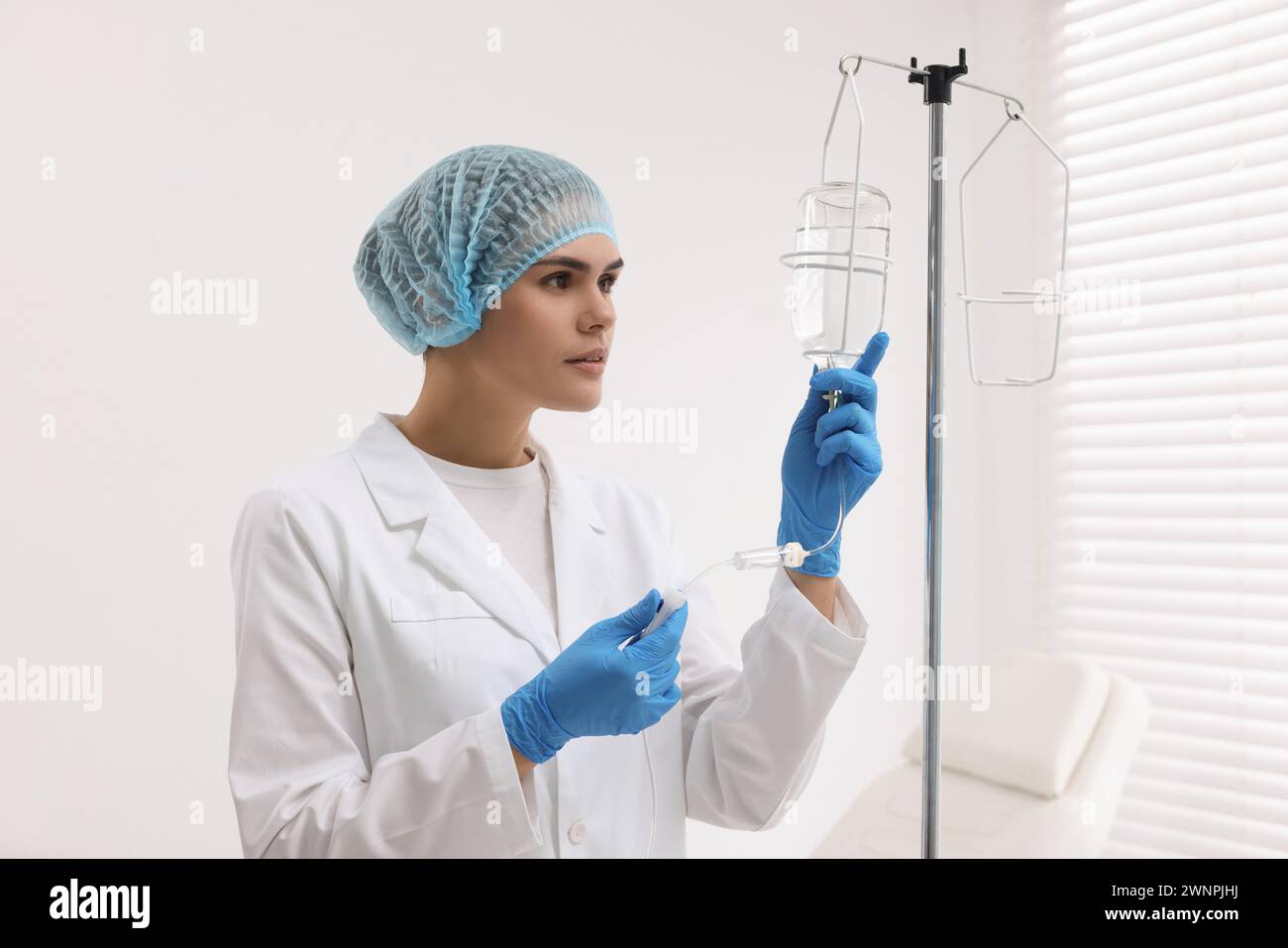 Female doctor setting up medical hi-res stock photography and images - Alamy