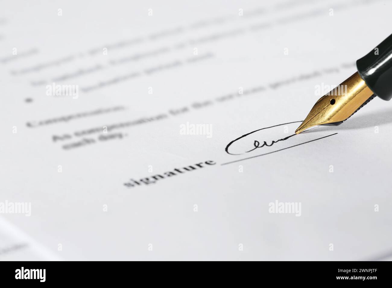 Signing notary document with fountain pen, closeup Stock Photo - Alamy