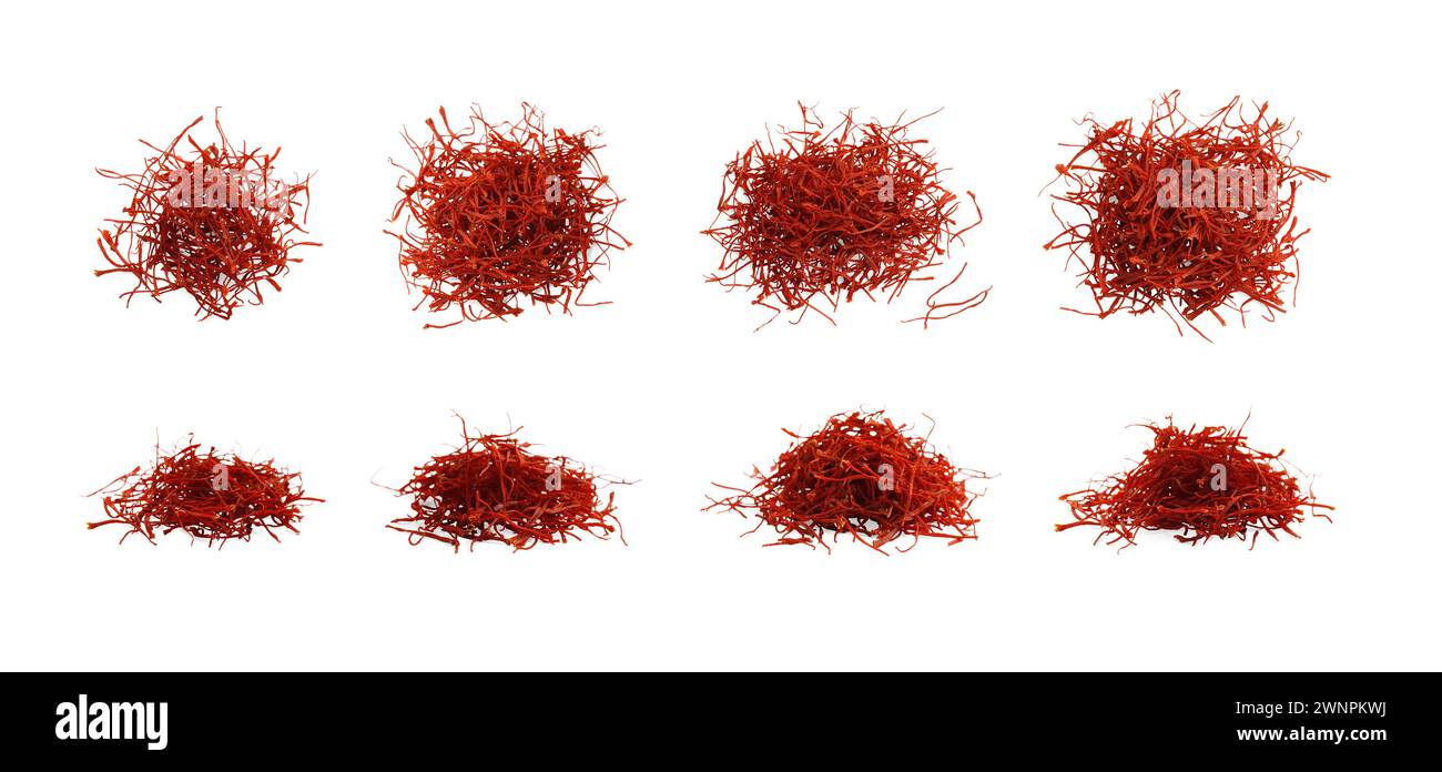 Piles of aromatic saffron isolated on white, top and side views Stock ...