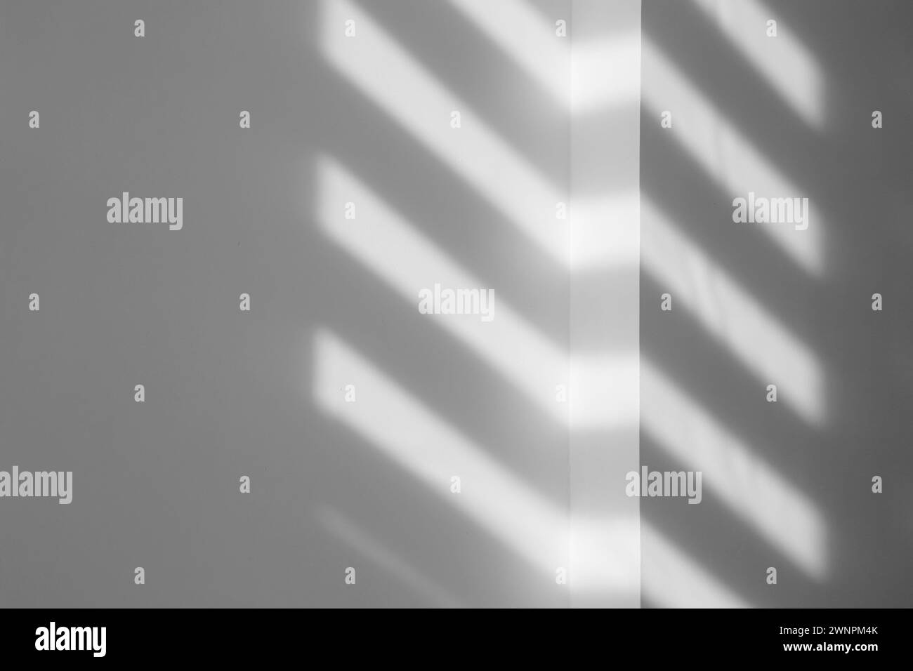 Light and shadows falling on white wall Stock Photo - Alamy