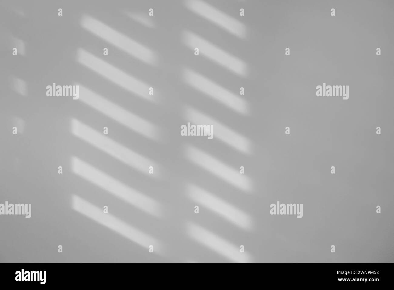 Light and shadows falling on white wall Stock Photo - Alamy