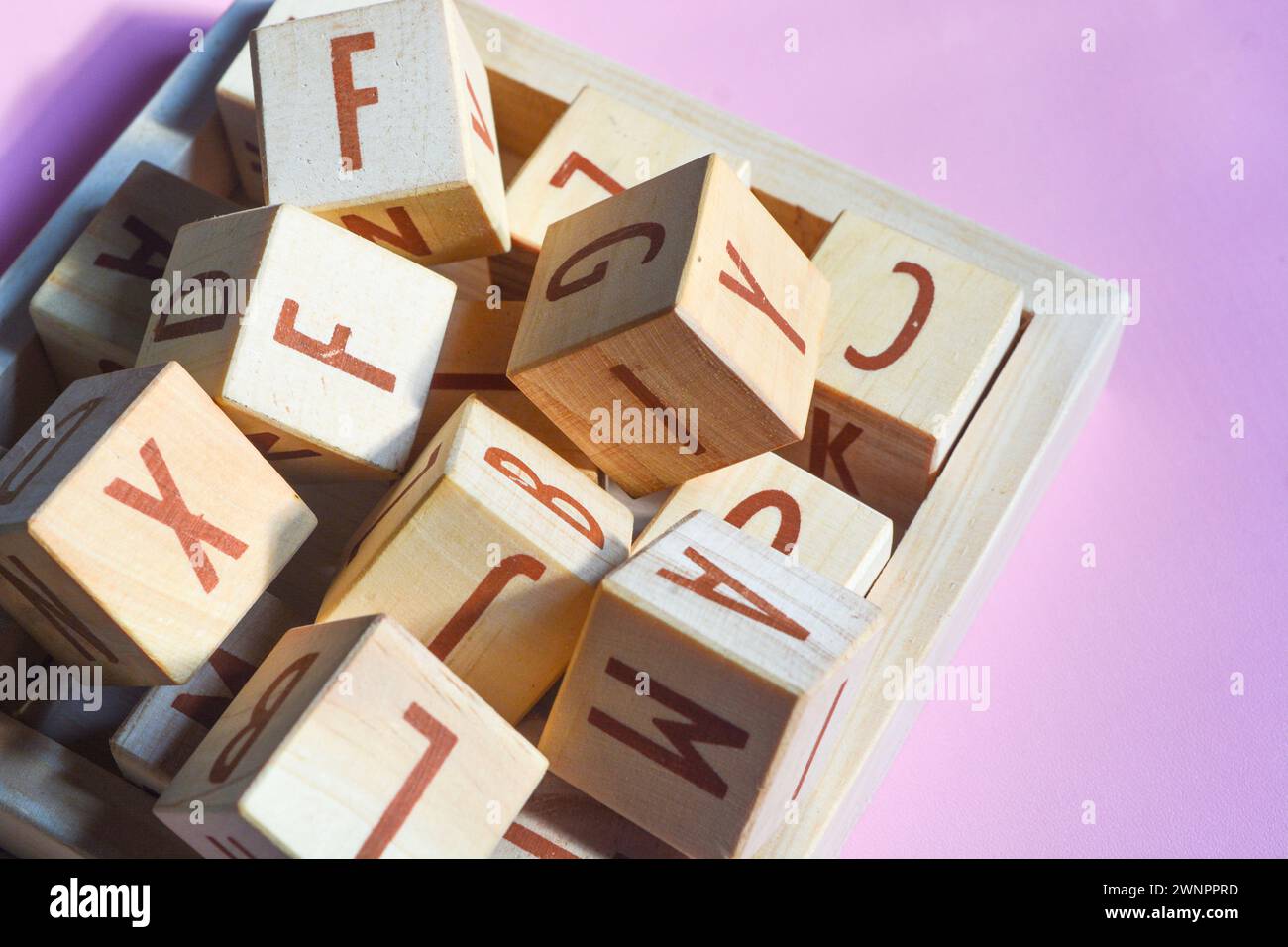 Alphabet letters on wooden block pieces, from above Stock Photo - Alamy