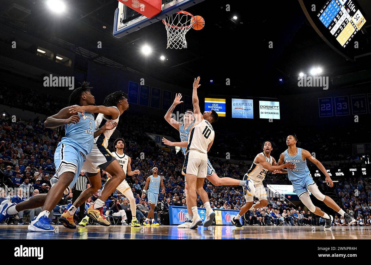 Indiana State's Robbie Avila, center left, drives against the Murray ...