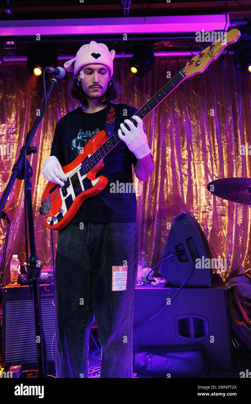 Harry Shapiro, bass guitarist of indie rock band Ugly, performing live ...