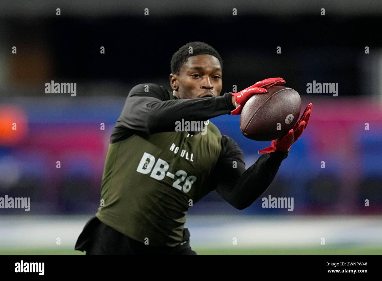 TCU defensive back Josh Newton runs a drill at the NFL football ...