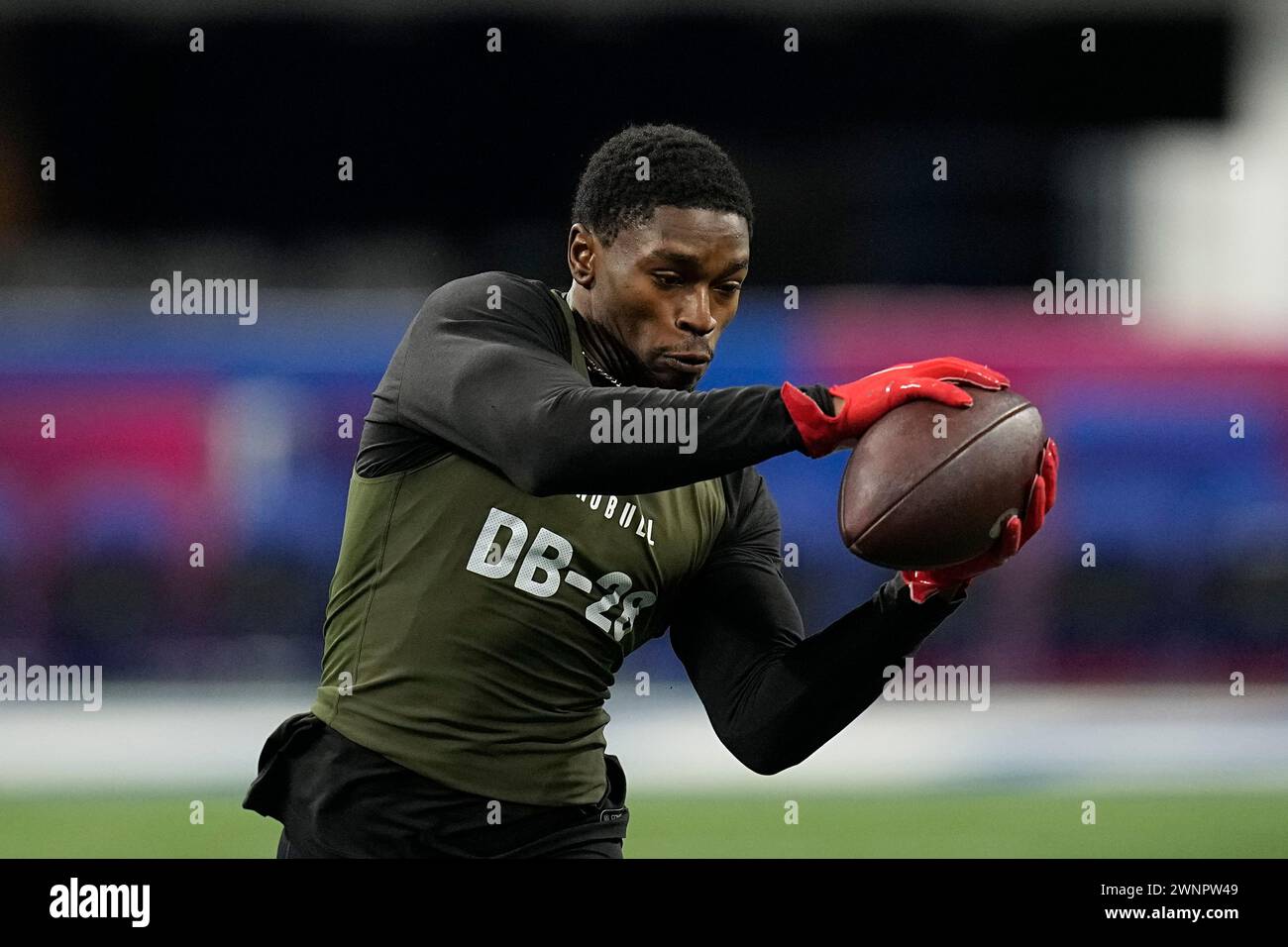 TCU defensive back Josh Newton runs a drill at the NFL football ...