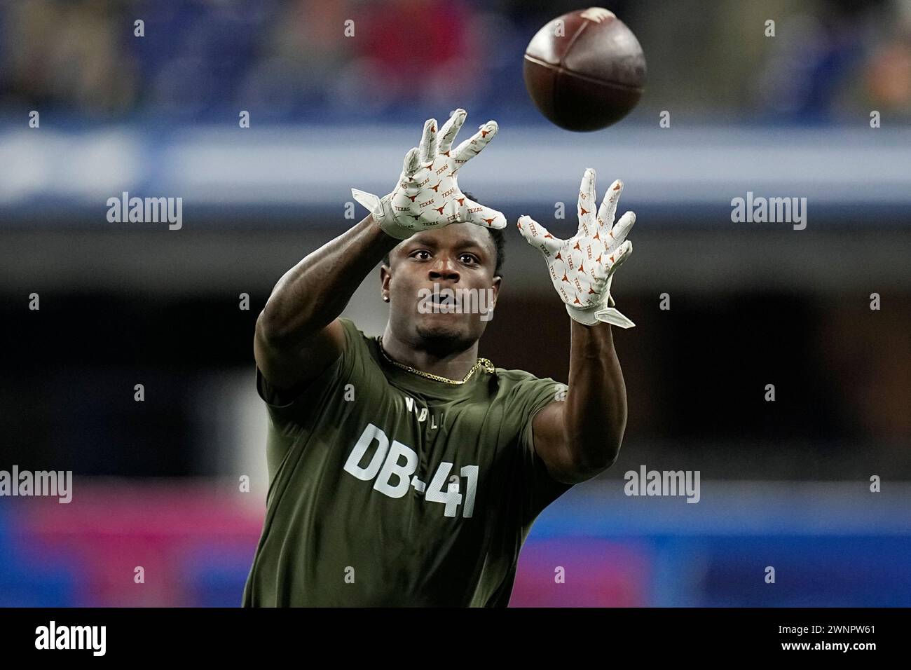 Texas defensive back Ryan Watts runs a drill at the NFL football ...