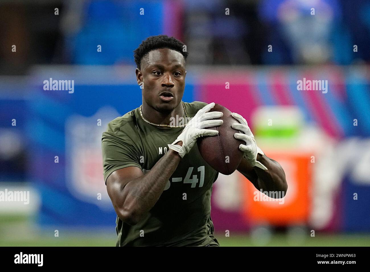 Texas defensive back Ryan Watts runs a drill at the NFL football ...