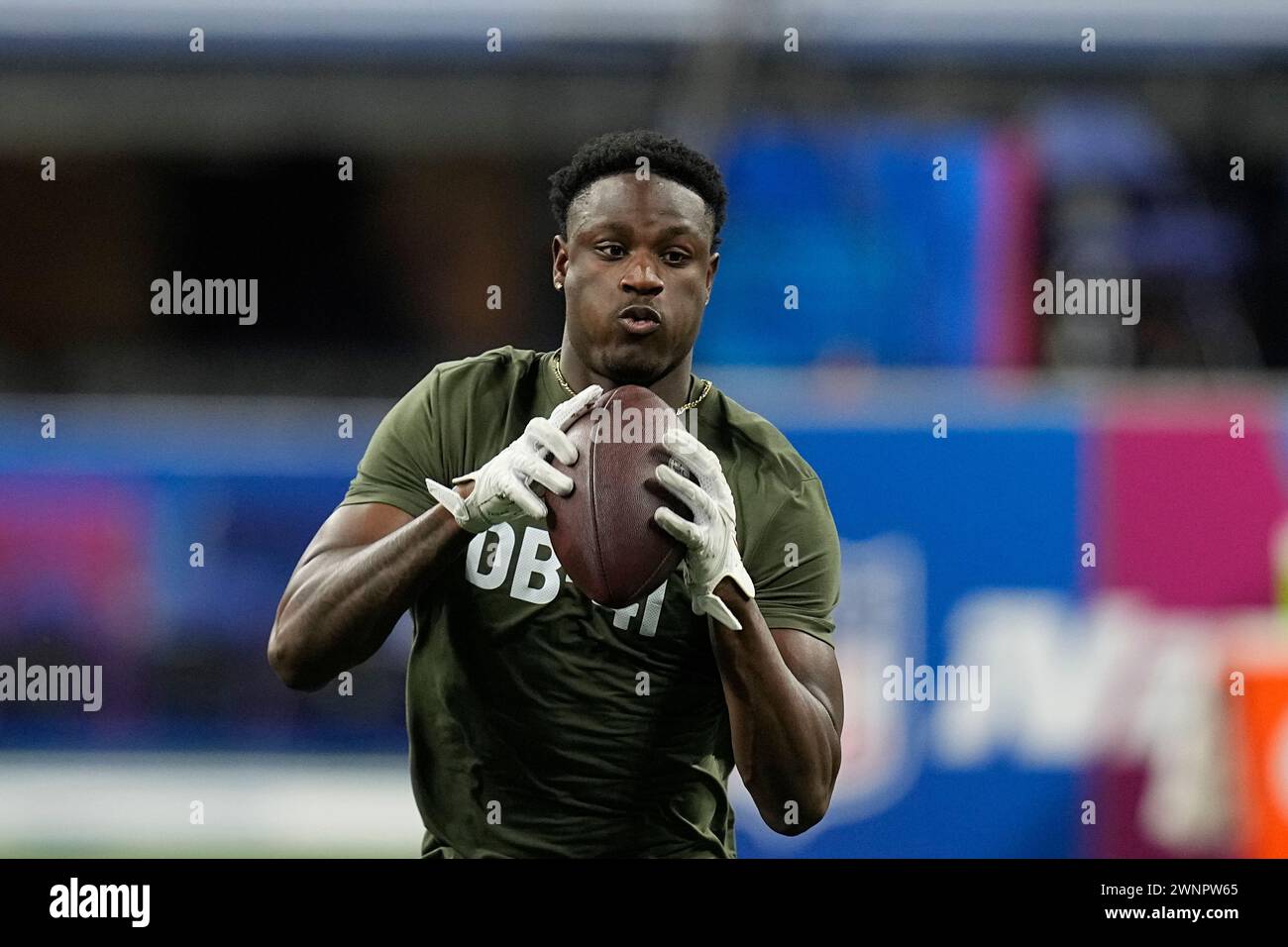 Texas defensive back Ryan Watts runs a drill at the NFL football ...