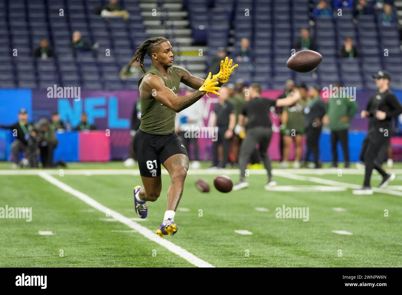 LSU defensive back Andre Sam runs a drill at the NFL football scouting ...