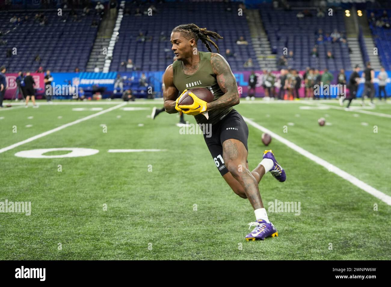 LSU defensive back Andre Sam runs a drill at the NFL football scouting ...