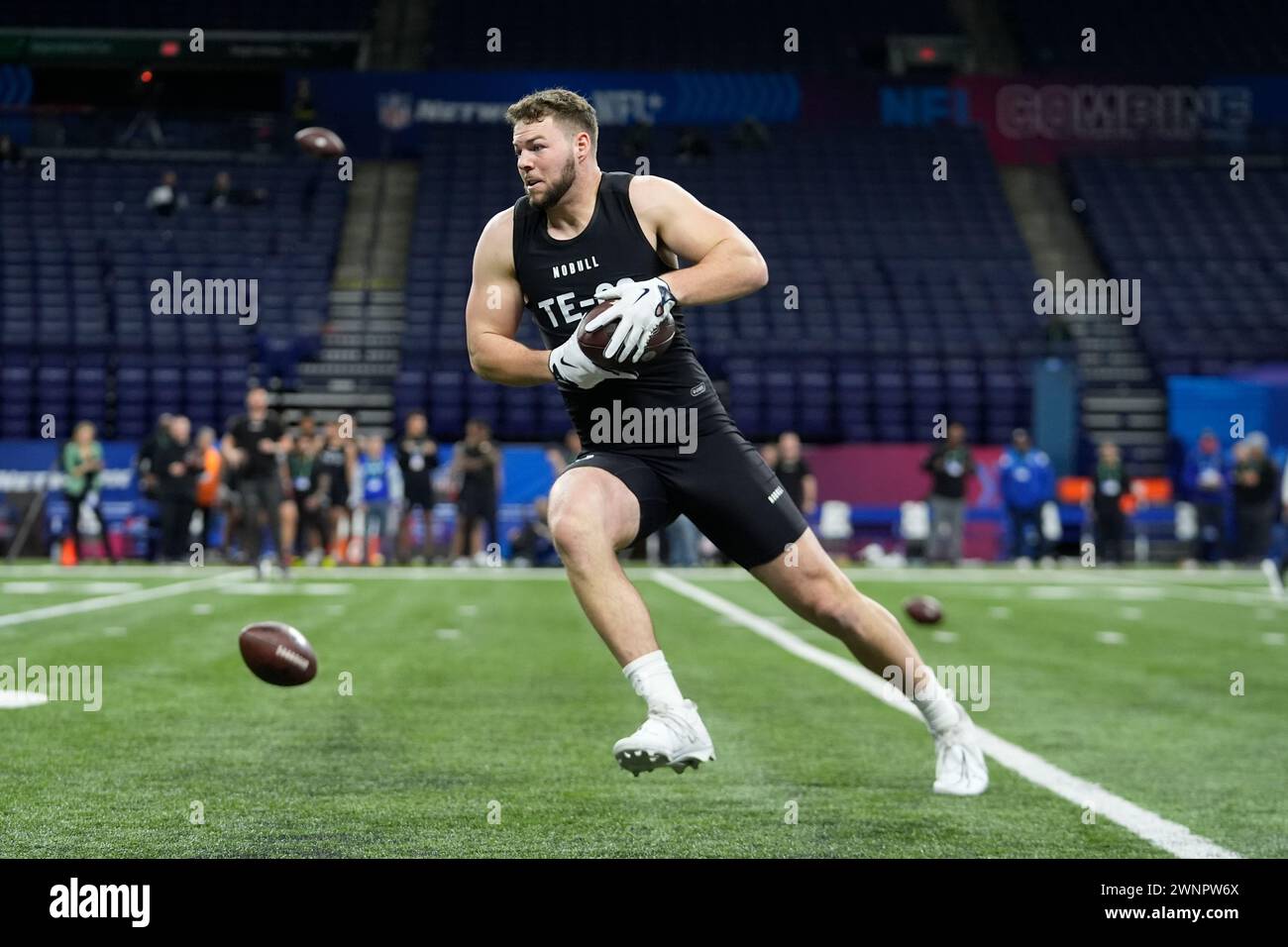 Arizona tight end Tanner McLachlan runs a drill at the NFL football ...