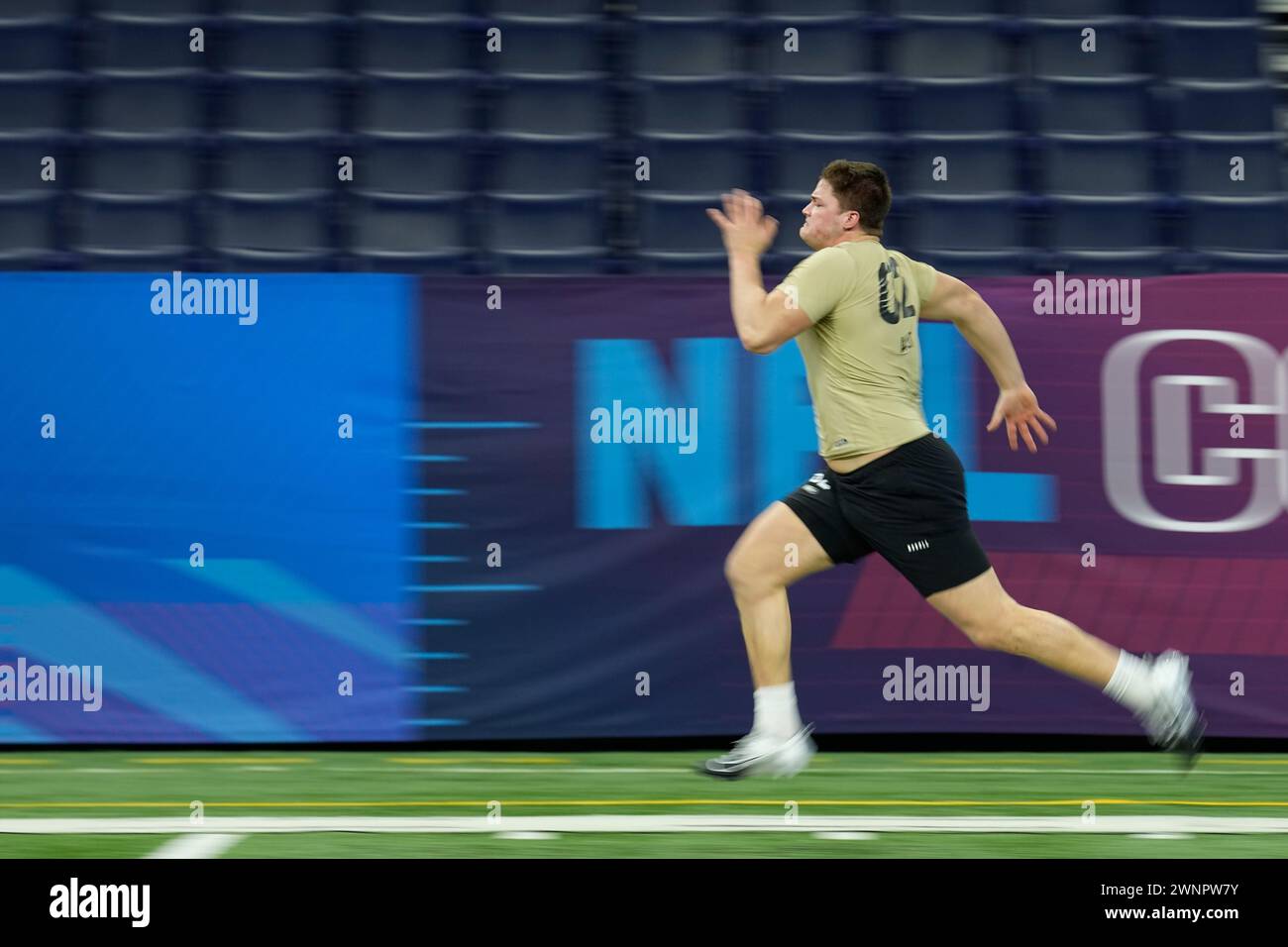 Notre Dame offensive lineman Joe Alt runs a drill at the NFL football ...
