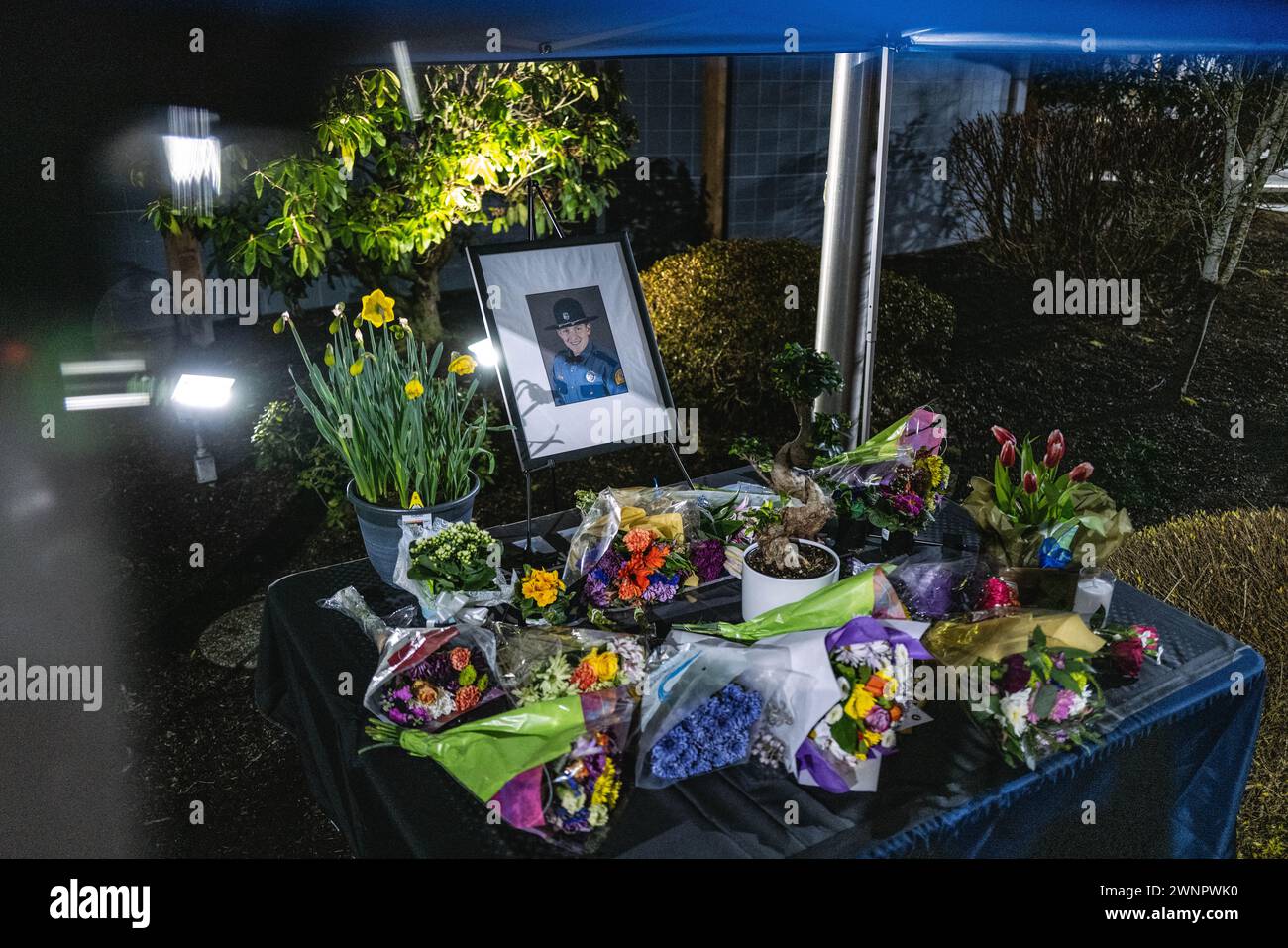 Marysville, United States. 02nd Mar, 2024. Flowers adorn the memorial ...