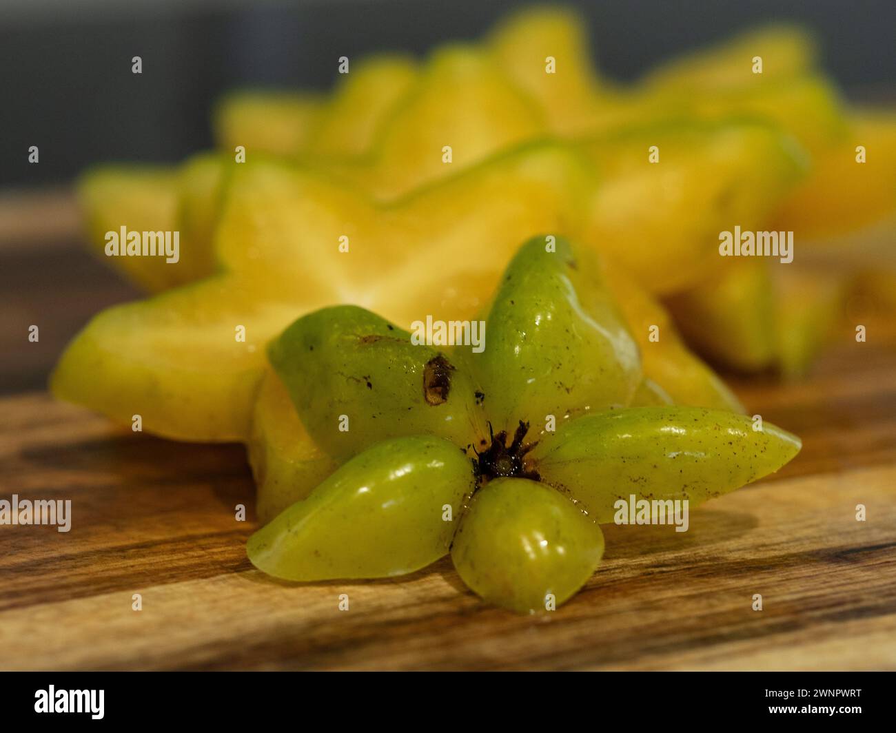 Sliced Star Fruit with the end piece Stock Photo - Alamy