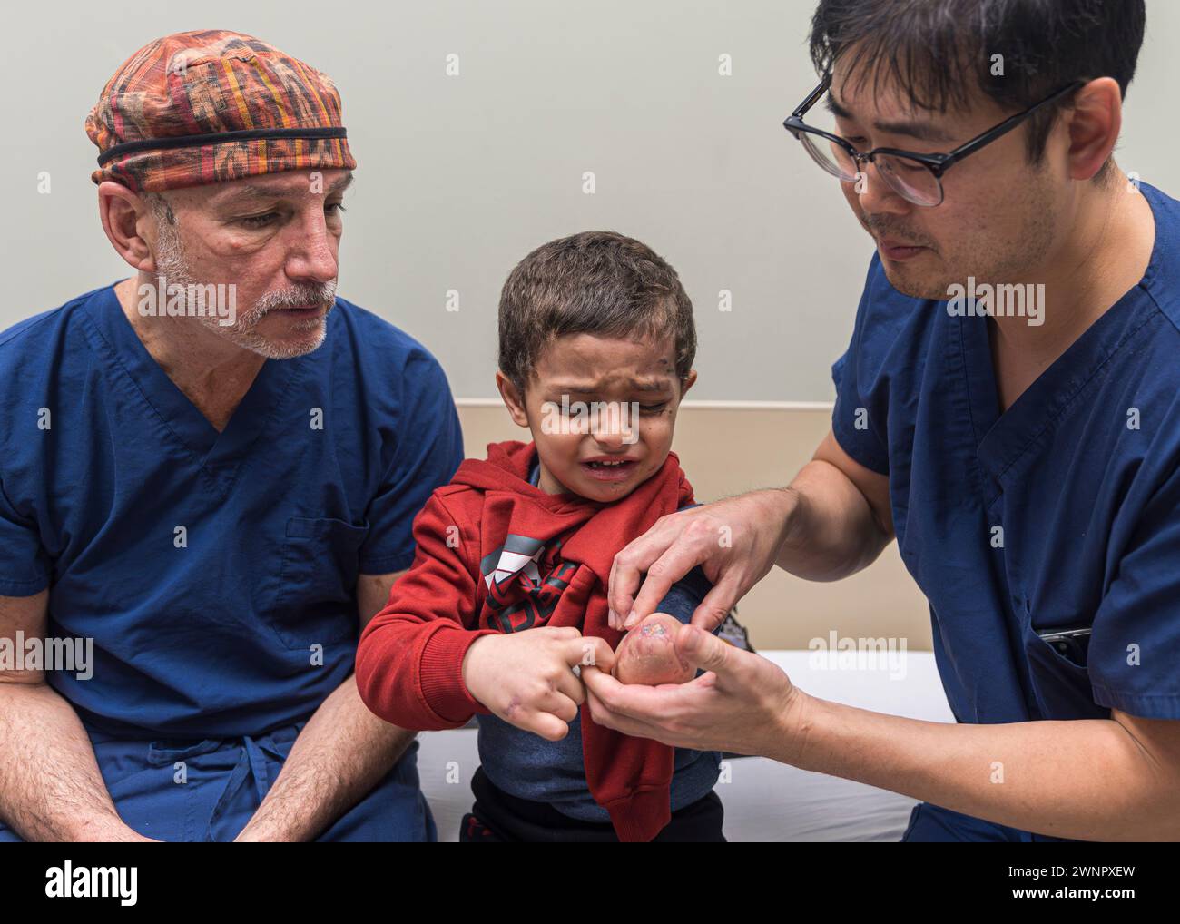 Plastic surgeon Dr. Eugene Park and orthopedic surgeon Dr. Scott Kozin ...