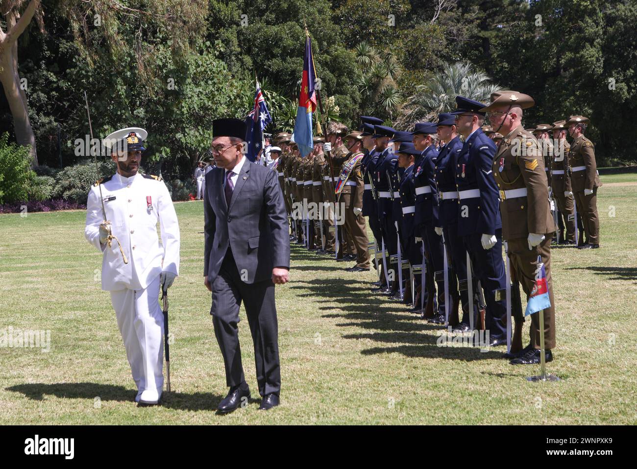 The Prime Minister of Malaysia Anwar Ibrahim walks with Lieutenant ...