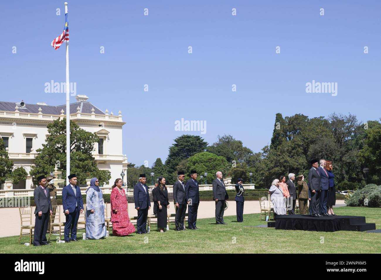 The Prime Minister of Malaysia Anwar Ibrahim, third right, stands with ...