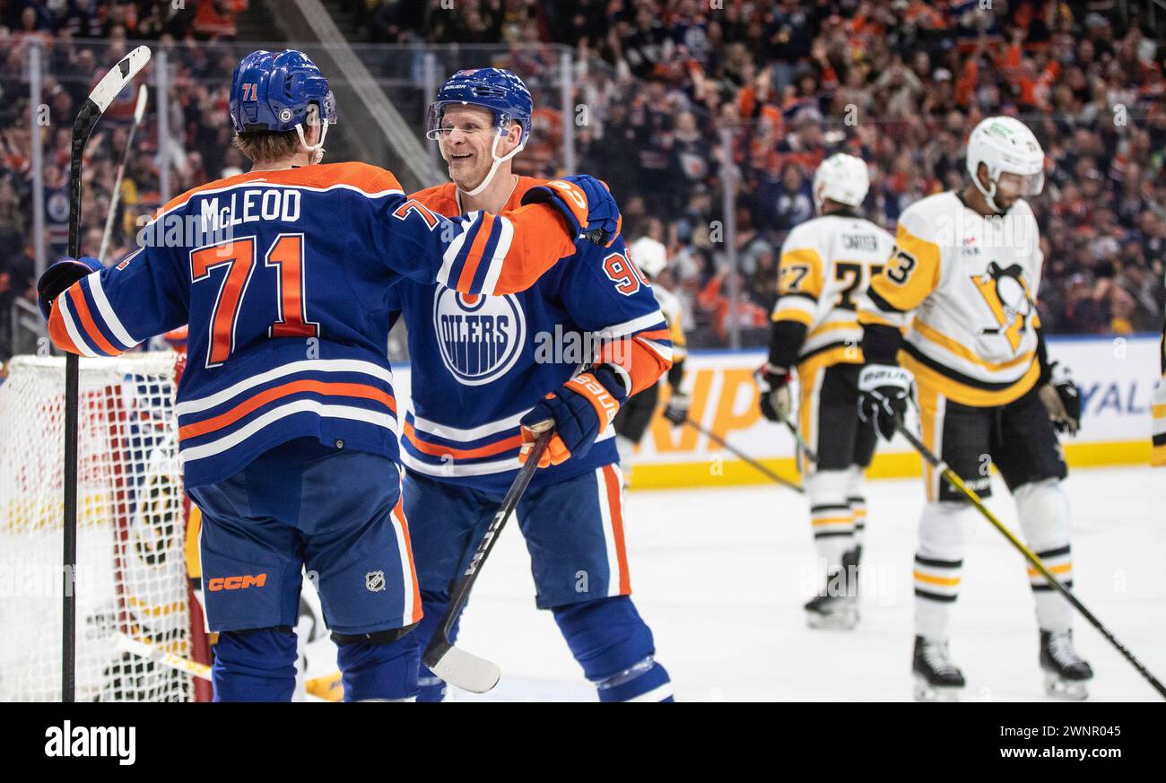 Edmonton Oilers' Ryan McLeod (71) and Corey Perry celebrate a goal ...