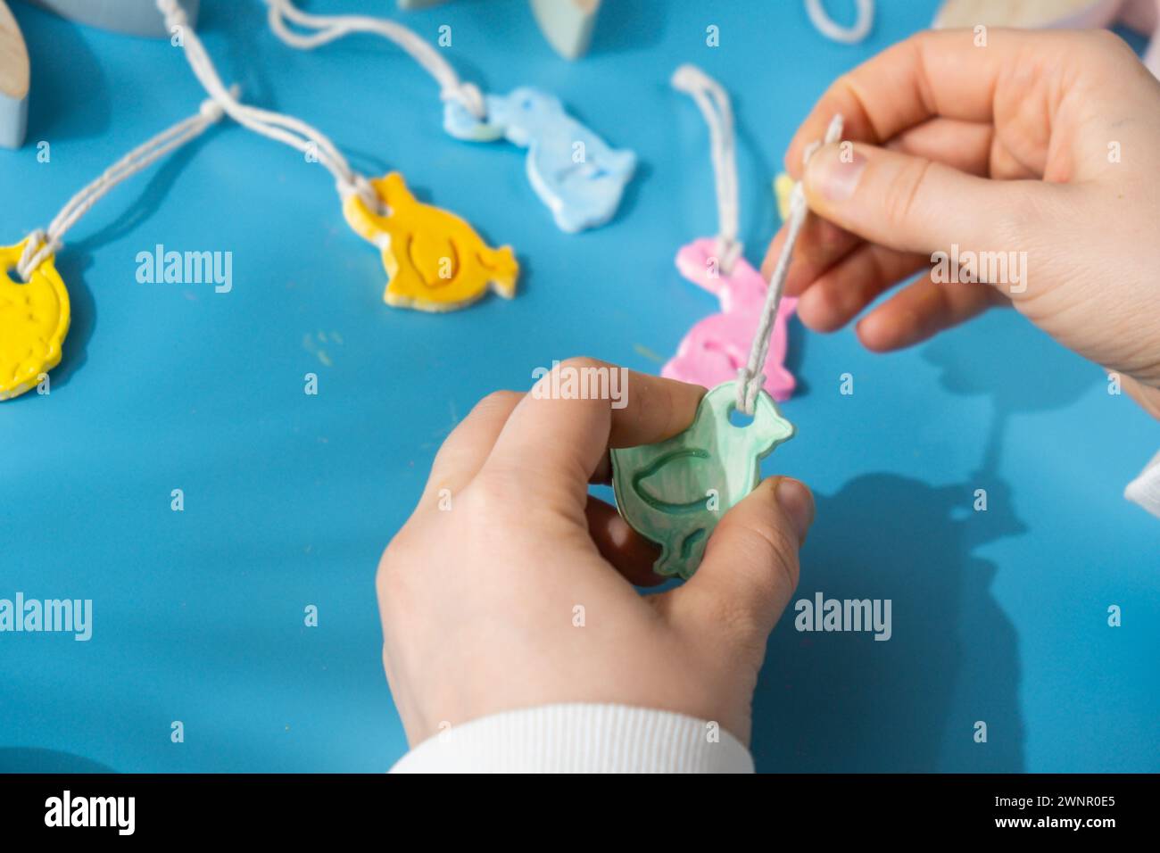 Unrecognizable artist do it yourself air dry clay crafts for Easter ...