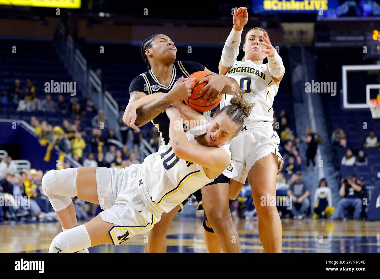 Purdue guard Jeanae Terry, left, and Michigan guards Jordan Hobbs (10 ...