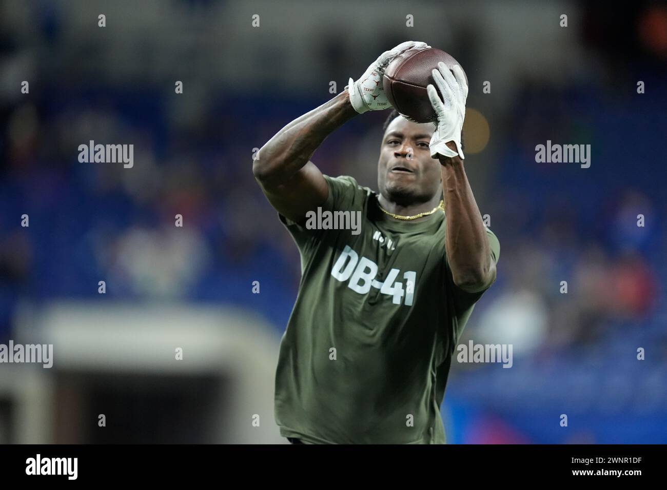 Texas defensive back Ryan Watts runs a drill at the NFL football ...