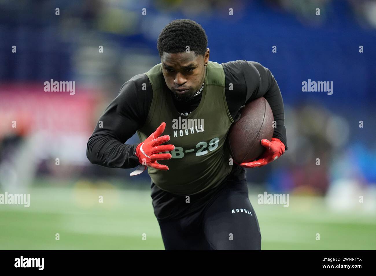 TCU defensive back Josh Newton runs a drill at the NFL football ...