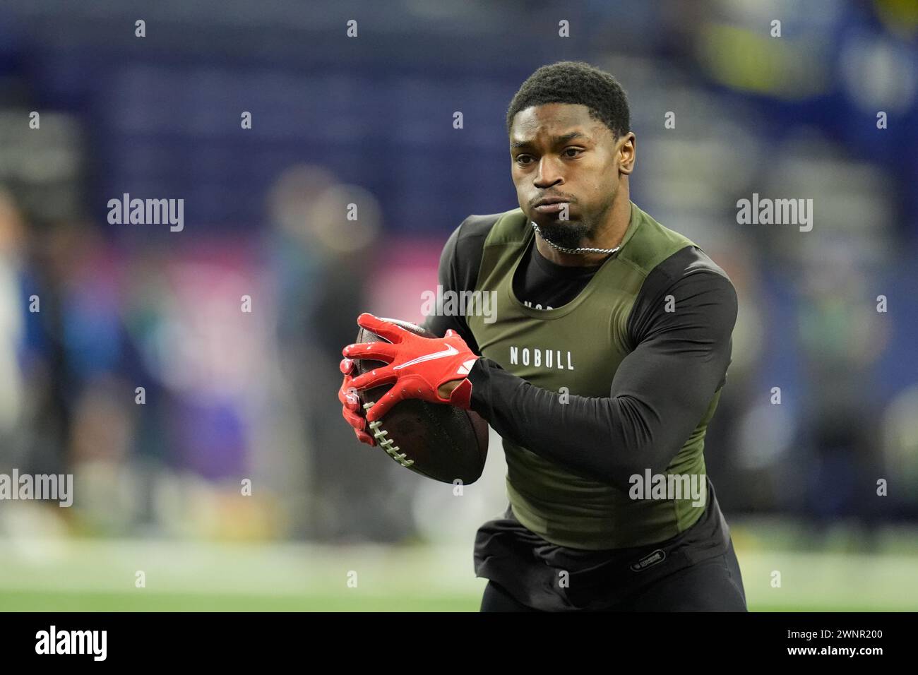 TCU defensive back Josh Newton runs a drill at the NFL football ...