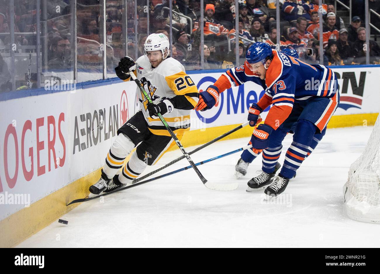 Pittsburg Penguins' Lars Eller (20) and Edmonton Oilers' Vincent ...