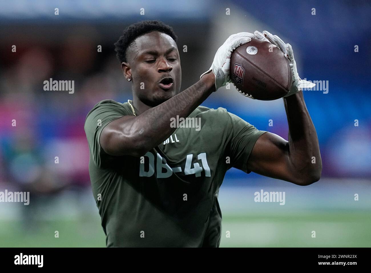 Texas defensive back Ryan Watts runs a drill at the NFL football ...