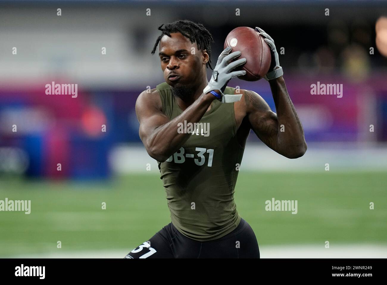 Auburn defensive back Nehemiah Pritchett runs a drill at the NFL ...