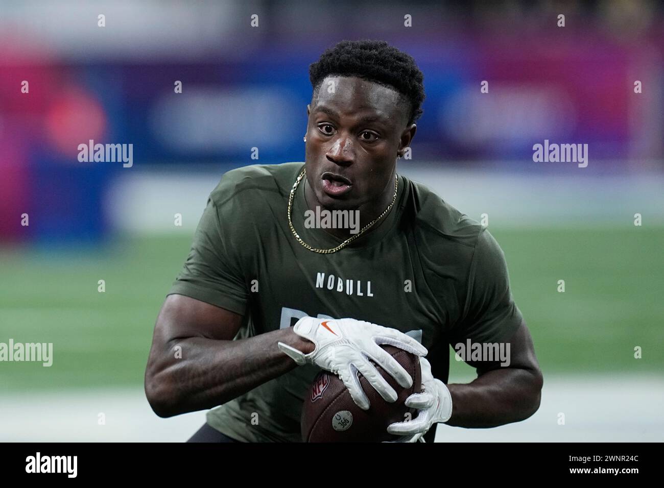 Texas defensive back Ryan Watts runs a drill at the NFL football ...