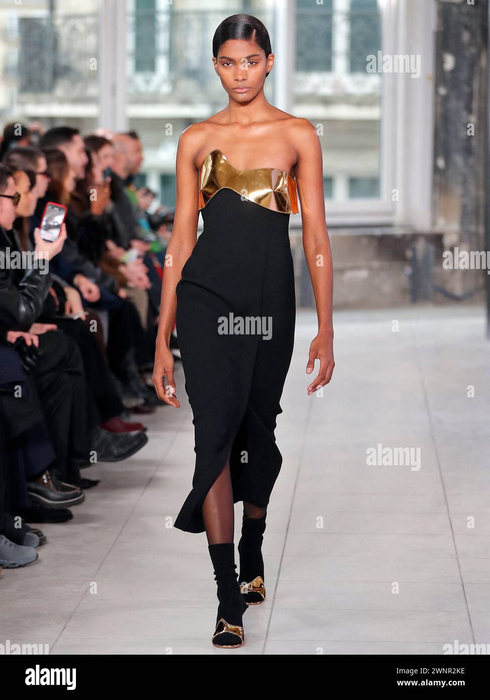 Paris, France. 03rd Mar, 2024. A model walks the runway during the ...