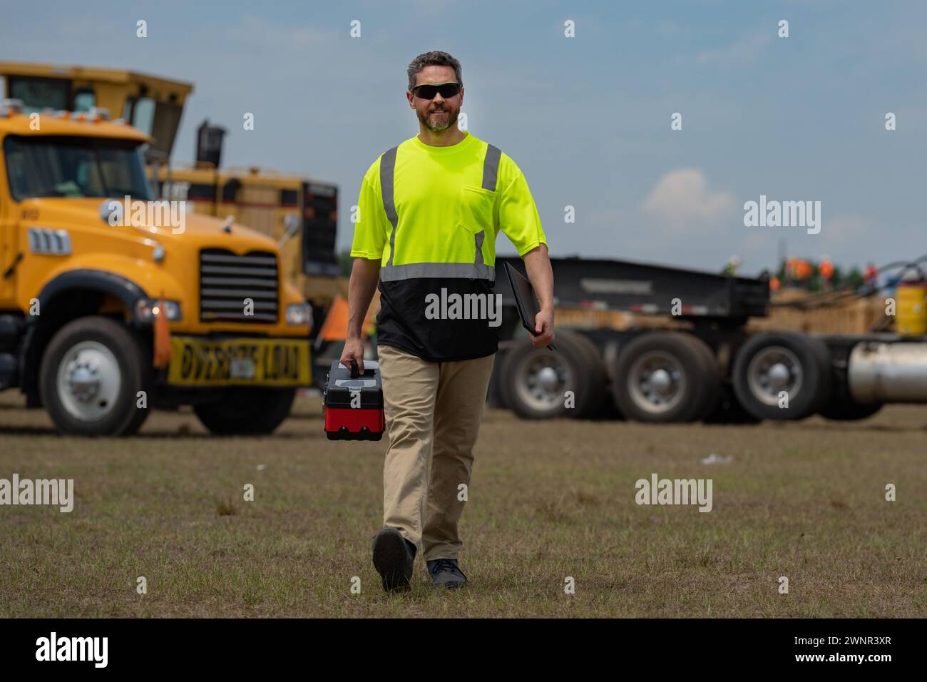 Hispanic 40 s worker builder on site construction. American middle aged ...