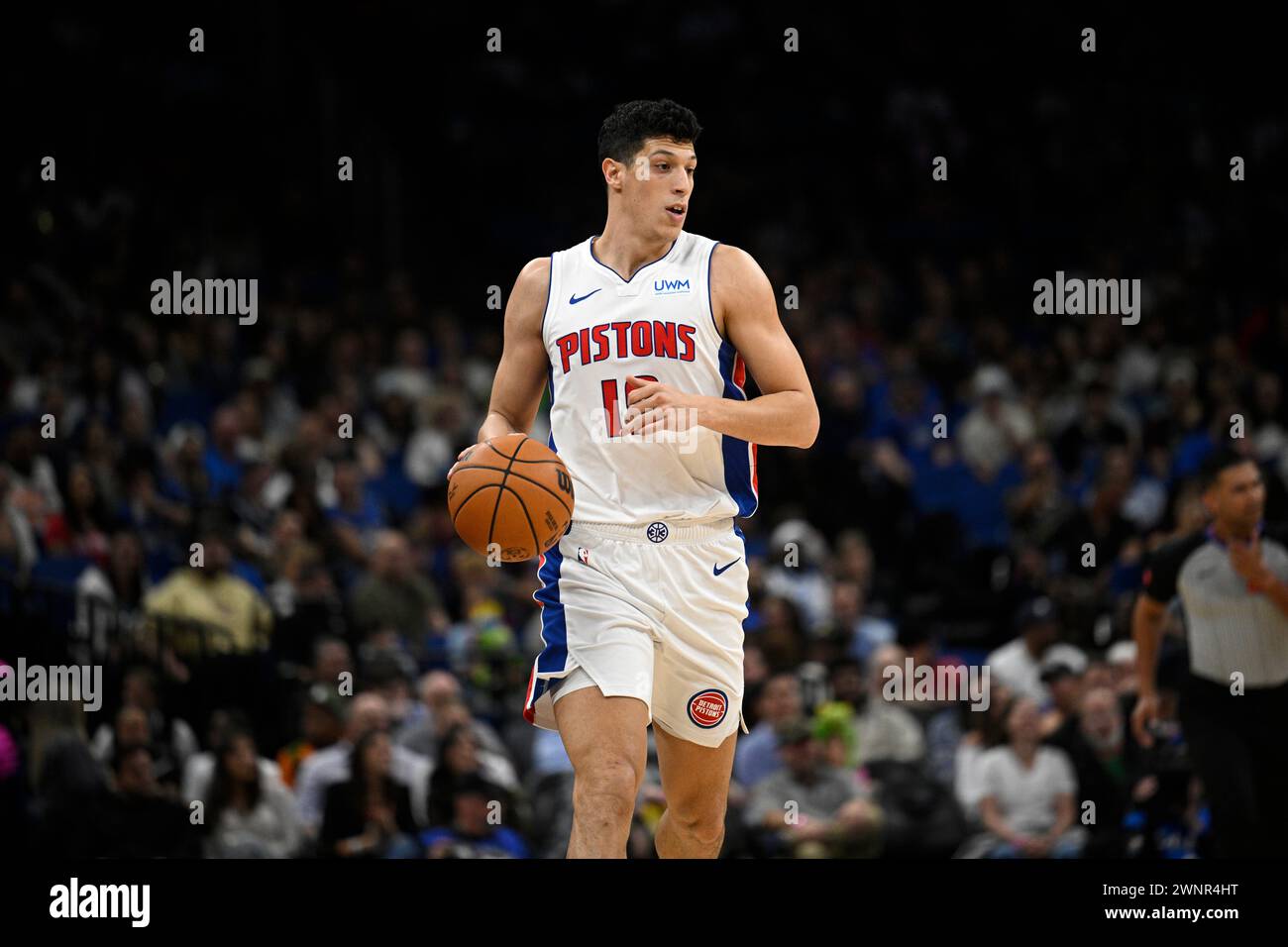Detroit Pistons forward Simone Fontecchio brings the ball up the court ...