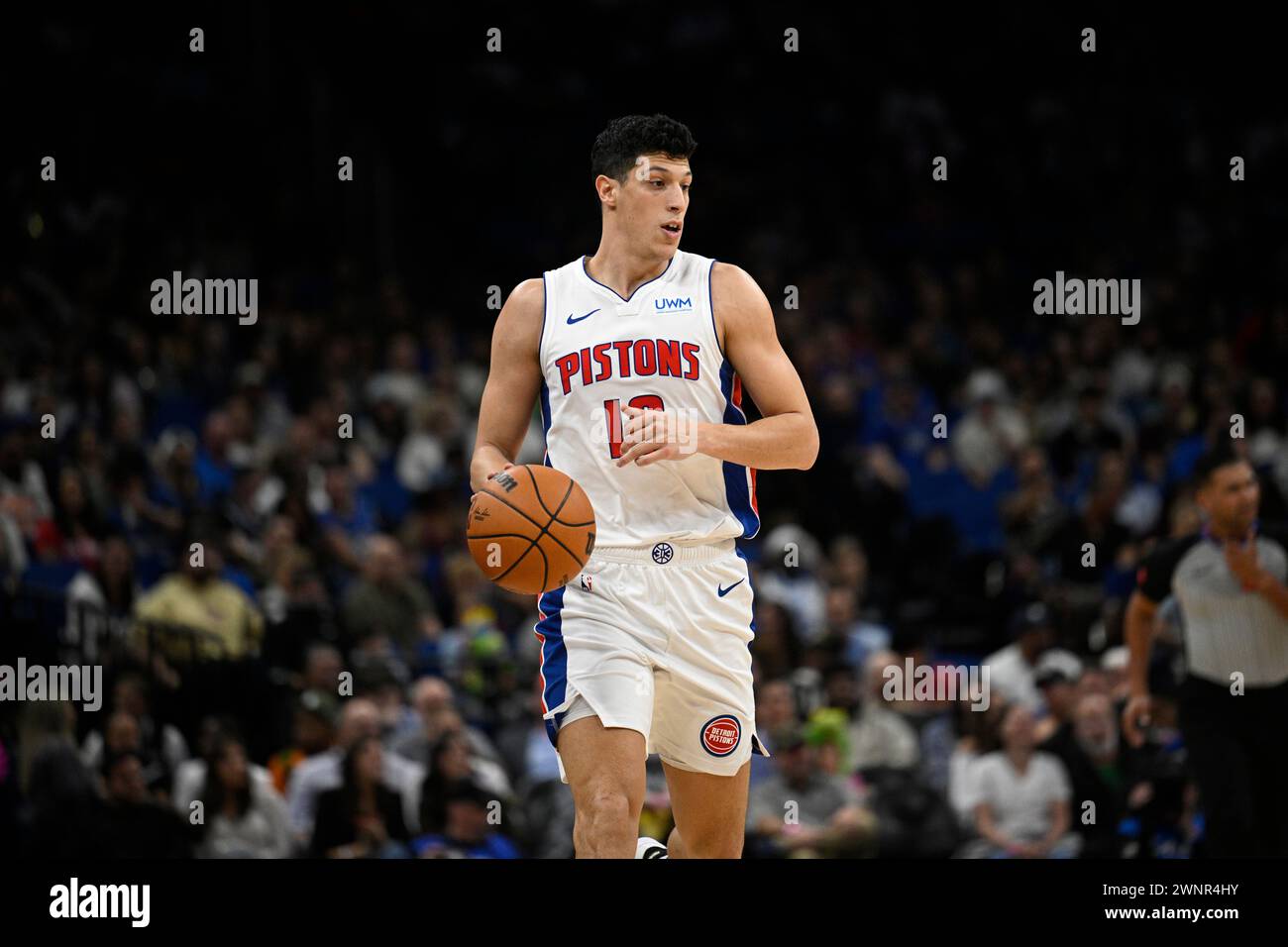 Detroit Pistons forward Simone Fontecchio brings the ball up the court ...