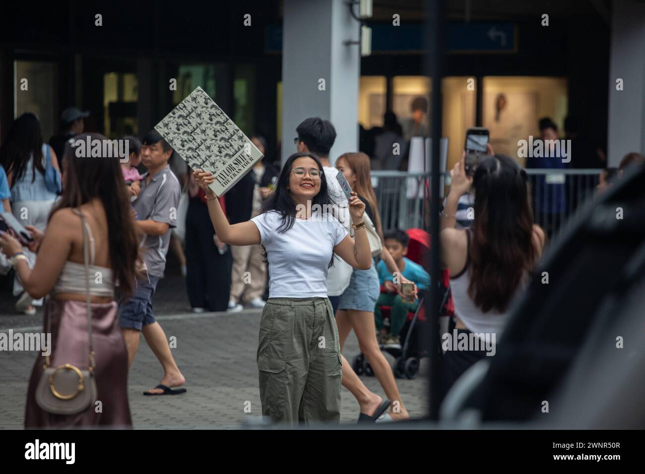 2 March 2024. A happy fan girl is holding Taylor Swift The Eras Tour ...