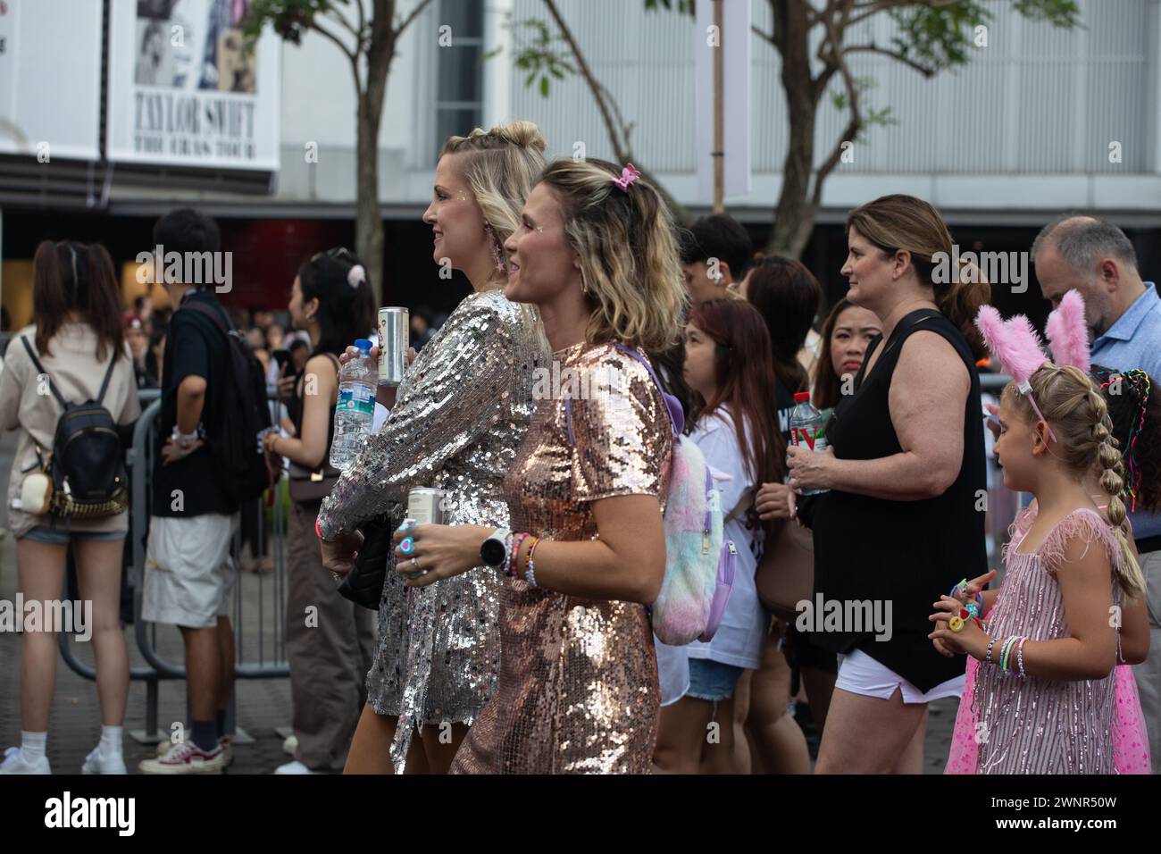 2 March 2024. Caucasian adult women fans dressed up in flashy party ...