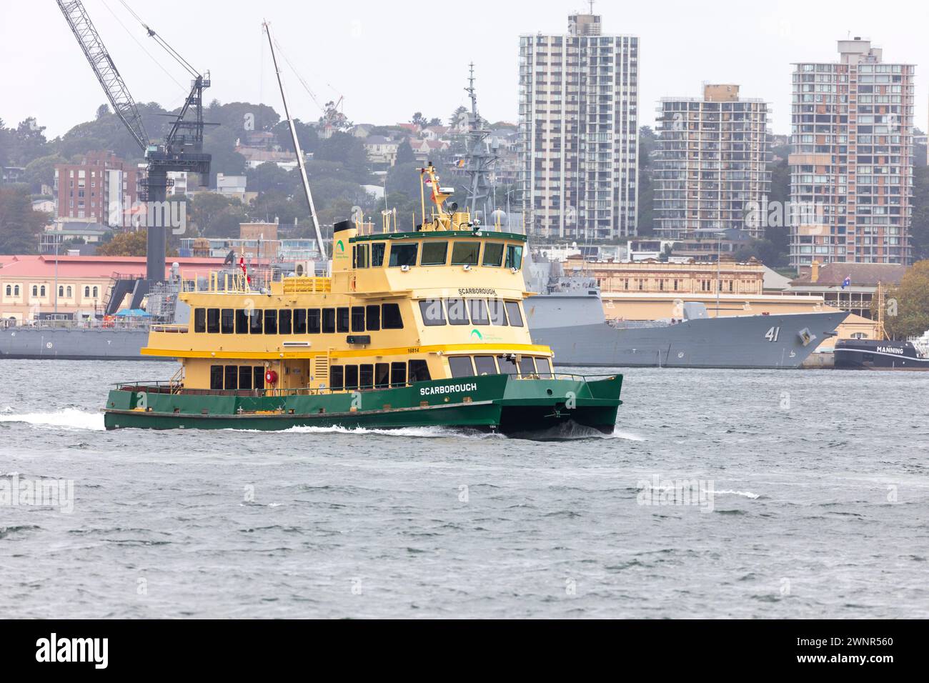 Sydney ferry, MV Scarborough, on Sydney harbour passes australian navy ...