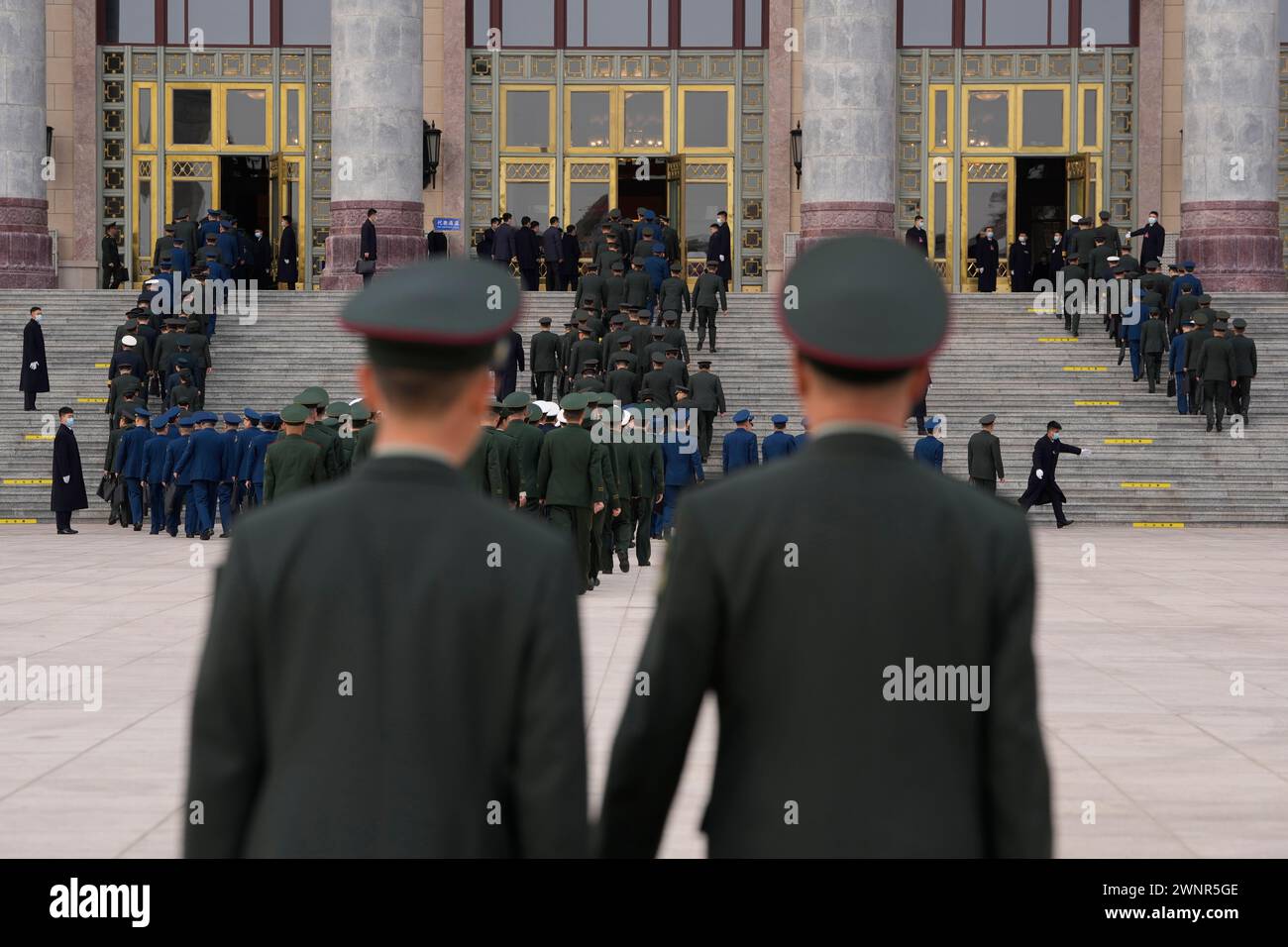 Chinese military officers arrive for a preparatory session of the ...