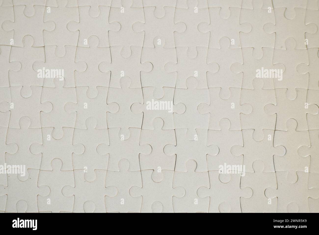 White jigsaw puzzle texture with a pattern Stock Photo - Alamy