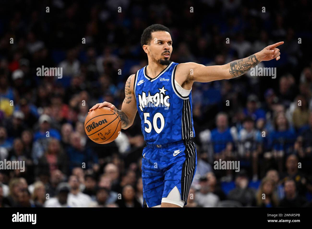 Orlando Magic guard Cole Anthony (50) brings the ball up the court ...