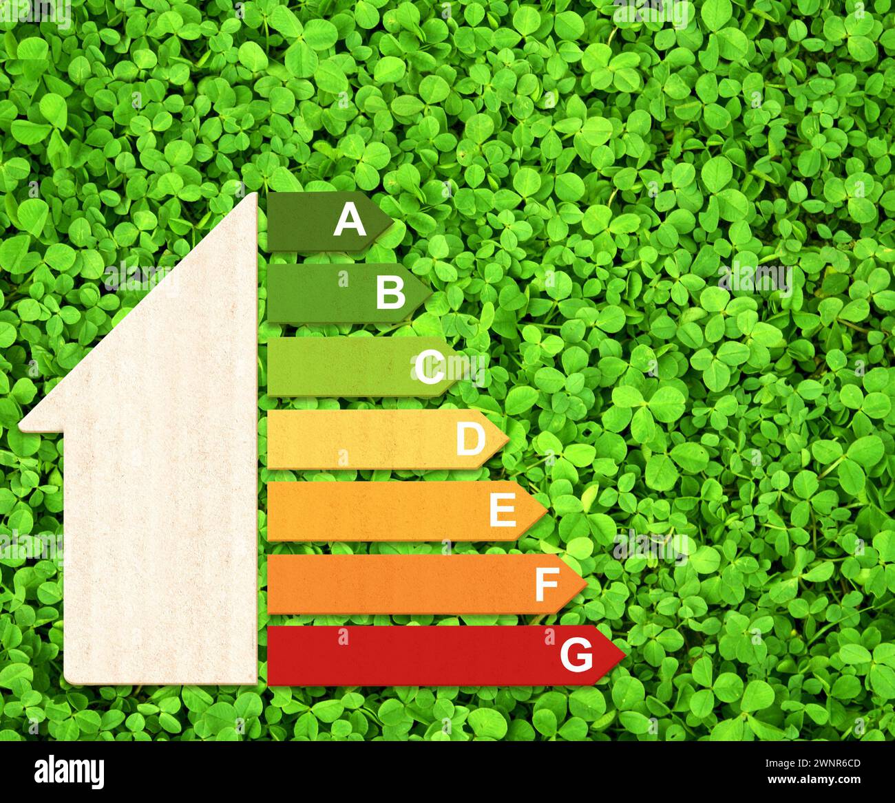 Top view of energy efficiency chart from cardboard texture on green ...