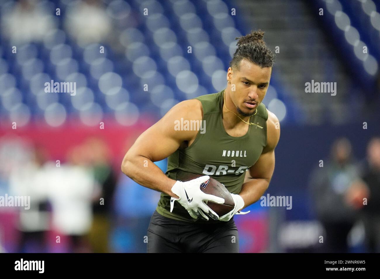 Washington State defensive back Jaden Hicks runs a drill at the NFL ...