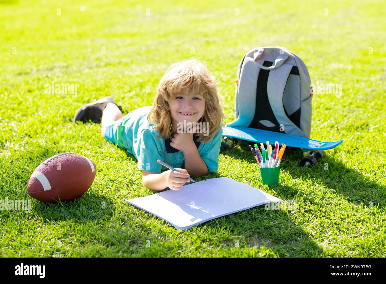 Kid painter draw on playground. Child drawing picture with crayon in ...