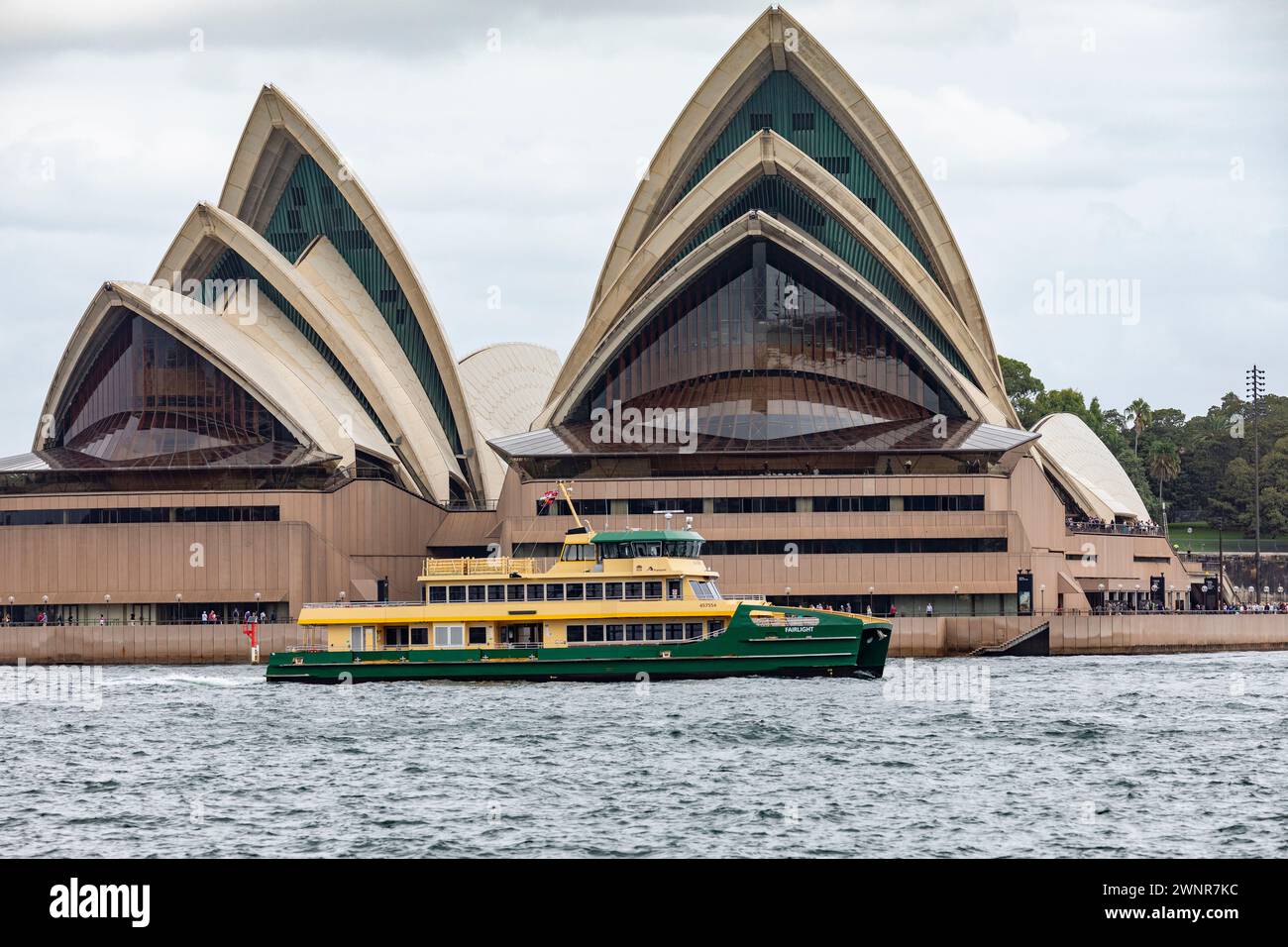 Sydney ferry the MV Fairlight travels past Sydney Opera House on route ...